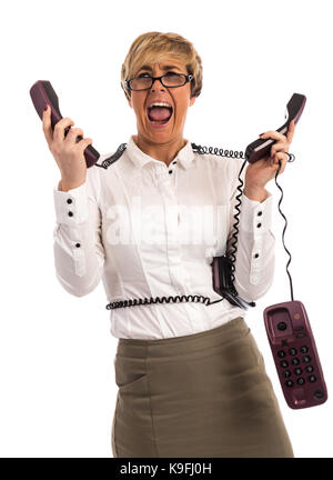 An overworked business woman struggles with too many phones Stock Photo ...