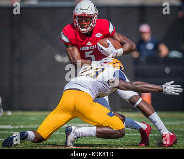 Louisville wide receiver Seth Dawkins (5) attempts to gain yardage ...