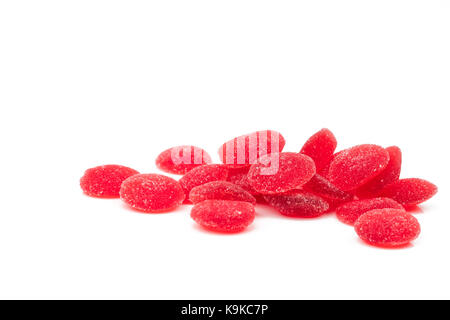 Pile of red vitamin pastille with clipping path. Multivitamin gummy for ...