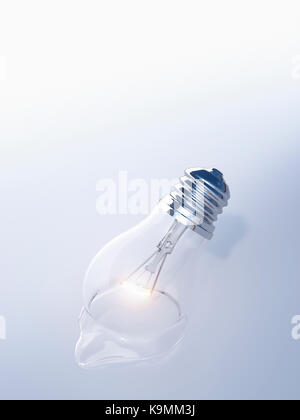 Melting light bulb Stock Photo - Alamy