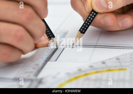 Measure, blueprint and architecture hands drawing lines for project development construction ...