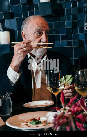 Manos Angelakis from LuxuryWeb having dinner at NOBU FIFTY SEVEN Stock ...