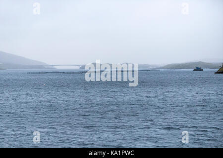 Bridge to Isle of Scalpay from ferry to Tarbert and a rural house ...