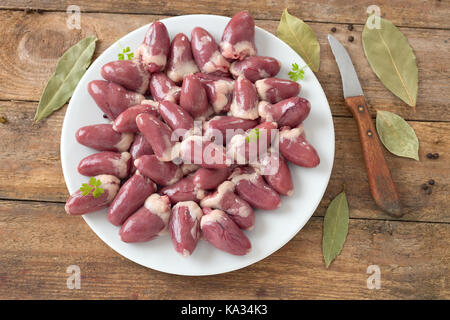 raw chicken hearts Stock Photo - Alamy