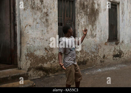 Young people messing around at street festival Stock Photo - Alamy