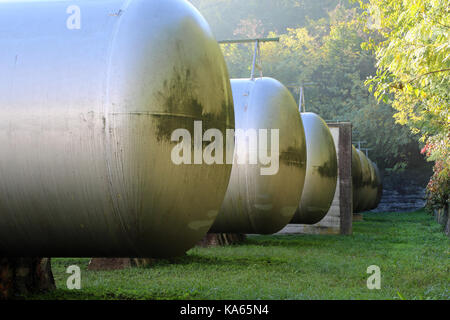 many huge tanks for the storage of methane gas in an industrial zone ...