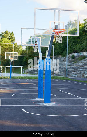 Indoor basketball basket net of white rope view from underneath against ...