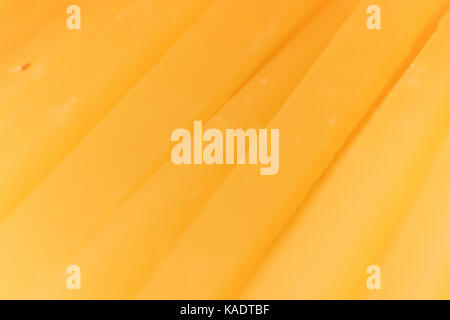 Solid cheese slices macro closeup. Background Texture Stock Photo - Alamy