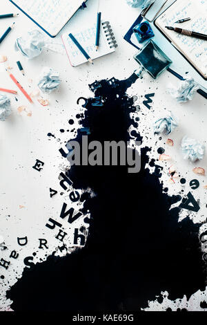 Header with spilled ink, crumpled paper, scattered letters, papers and ...