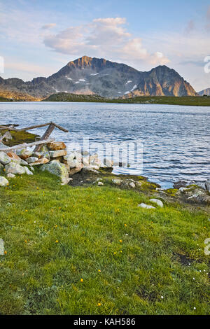 Last Ray of sun over Tevno Lake and Kamenitsa peak, Pirin mountain ...