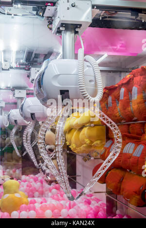 Claw crane - toy automat with plush animals Stock Photo - Alamy