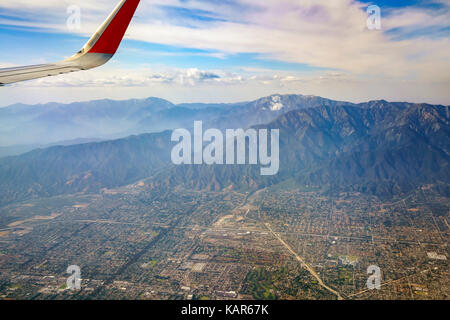 Aerial view of Upland, Rancho Cucamonga, view from window seat in an ...