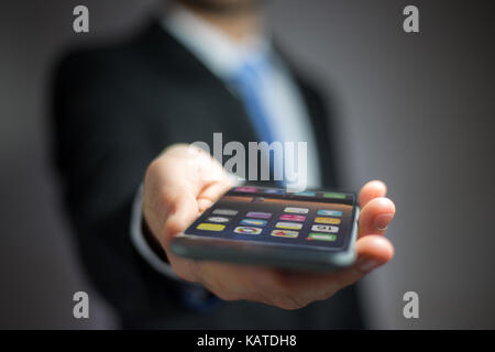 View of a Hand holding smartphone with operating system screen and ...