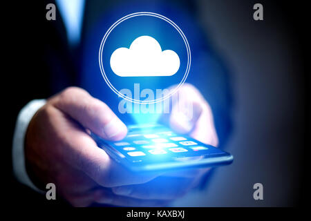 Concept view of cloud storage icon flying out a smartphone - technology concept Stock Photo - Alamy