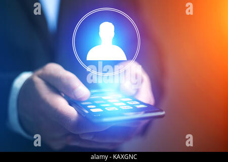 Concept view of professional network with contact icon over smartphone ...