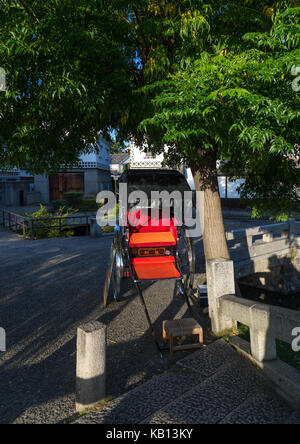 A rickshaw at Kurashiki Bikan Historical Quarter (old town) in Japan ...