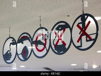 Warning signs in the touch pool in kaiyukan aquarium, Kansai region ...