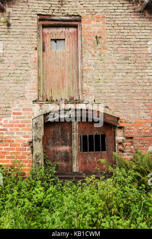 old derelict barn gable doors Stock Photo - Alamy