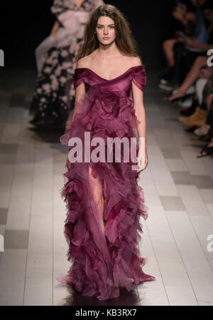 Model Marie Damian walks on the runway during the J.W. Anderson Fashion ...