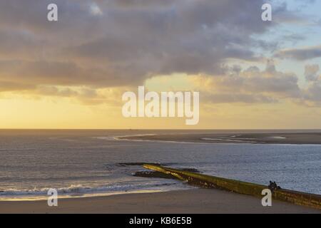 Borkum's beach with a wavebreaker and the sandbank Hohes Riff on the ...