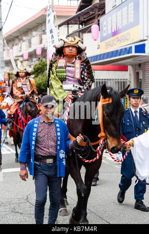 Horseback Samurai warriors in procession at Yabusame event Stock Photo ...