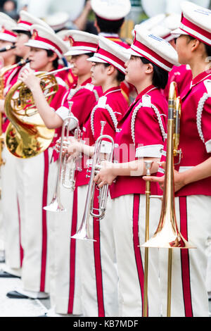 Japan, Osaka, Tada. Yearly Genji parade. Young woman riding horse ...