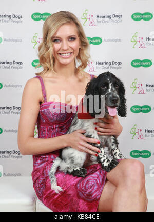 EDITORIAL USE ONLY Rachel Riley with hearing dog puppy Kasper, at the ...