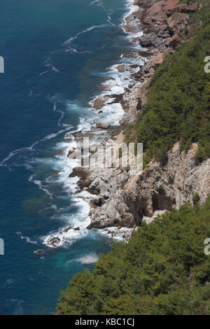 A vertical shot of waves washing the coastline of Sandfly Bay, Dunedin ...
