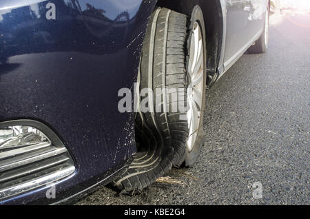 Damaged tire after tire explosion at high speed on highway Stock Photo ...