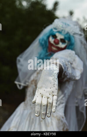 Woman in scary clown costume taking part in the Samhuinn Fire Festival ...