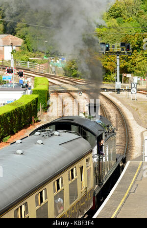 Steam train leaving Kingswear on the Dartmouth Steam Railway, hauled by ...
