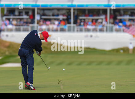 Justin Thomas hits from the bunker on the 13th hole during a practice ...