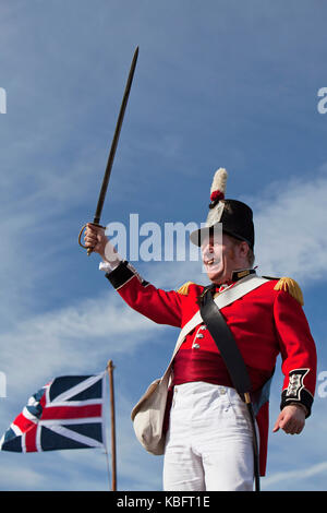 Red coat British Army officer with sword drawn overhead Stock Photo - Alamy
