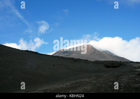 Footpath to Etna Volcano with smoke in winter, volcano landscape ...