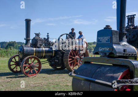 Vintage Steam Traction Locomotive with flywheel driving a belt driving ...