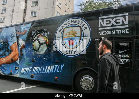 A Manchester City football team bus. Holloway, London Stock Photo - Alamy