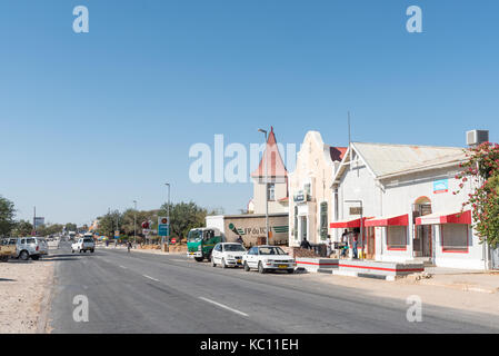 KARIBIB, NAMIBIA - JULY 3, 2017: A street scene with a shopping centre ...