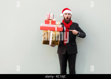 amazed boss pointing finger on modern wireless laptop. mature ...