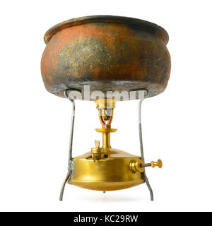 Old primus stove and clay pot from different angles isolated on white ...