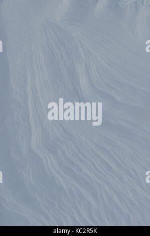 Streaks of snow. Snowflakes on the ice. Winter and frost. ice sheet ...