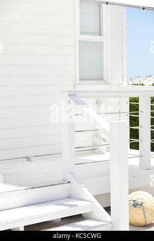 White slatted wooden beach house Stock Photo - Alamy
