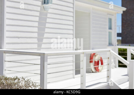 White wooden beach house Stock Photo - Alamy