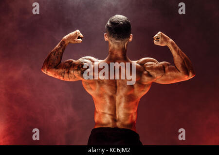 Back Double Biceps Pose Stock Photo - Alamy