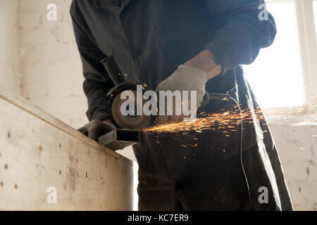 closeup of circular grinder cutting iron Stock Photo - Alamy