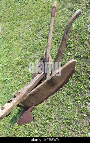 ancient wooden ancient plow over meadow Stock Photo - Alamy