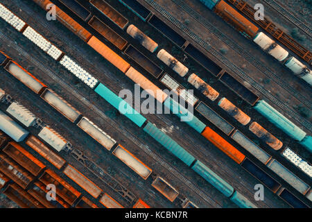 Aerial view of colorful freight trains. Railway station Stock Photo - Alamy