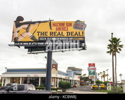 Machine Gun America billboard in Kissimmee, Florida, a popular tourist ...