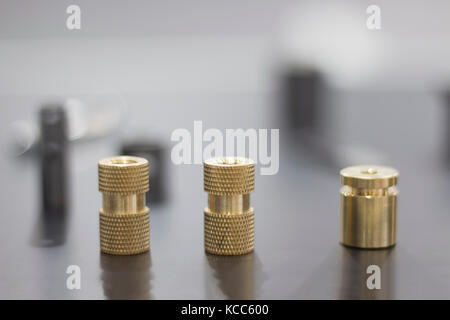 small metal mechanical spare parts for industry Stock Photo - Alamy