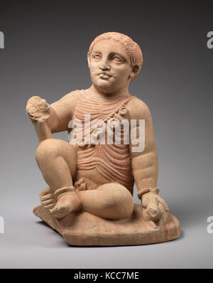 Limestone statuette of a seated temple boy on an inscribed base, 4th ...