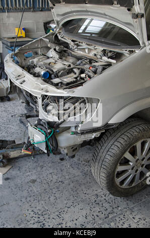 View of the engine bonnet of a crashed car Stock Photo - Alamy